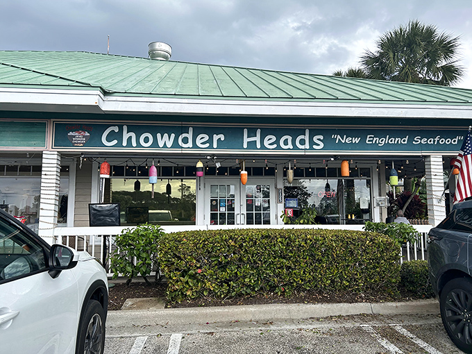 The green-roofed sanctuary of Chowder Heads stands like a New England mirage in Jupiter, complete with colorful buoys and the promise of seafood salvation.