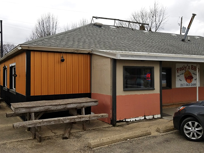 The humble exterior of Pauly&rsquo;s BBQ in Arthur may not turn heads, but inside this cozy spot, smoky aromas and hearty flavors tell you you&rsquo;re in for something special.