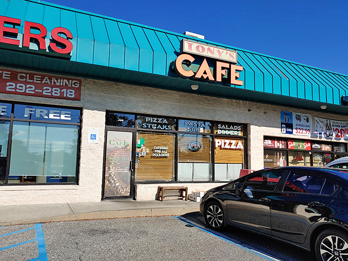 Tony's Cafe sits unassumingly in a Newark strip mall, its turquoise awning a beacon for pasta pilgrims seeking authentic Italian flavors.
