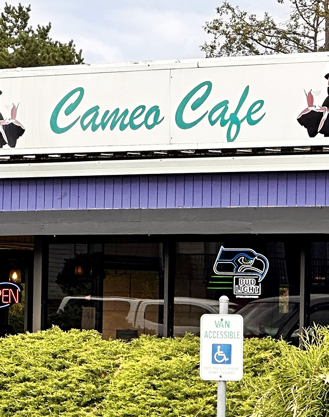The teal script of Cameo Cafe's sign promises comfort before you even step inside. Like finding a handwritten letter in a world of text messages.