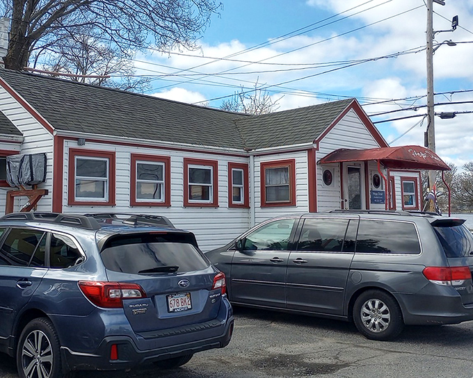 The white clapboard exterior with cheery red trim says "classic American diner" before you even step through the door.