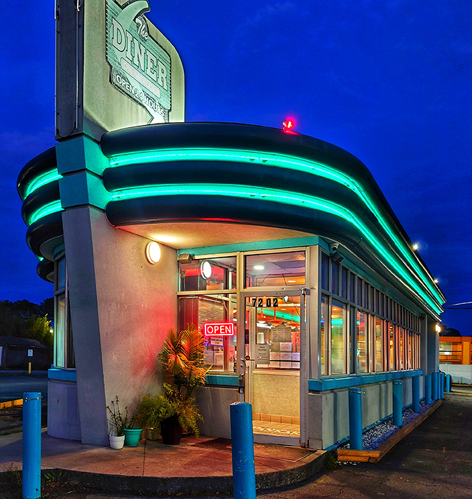 When the blue hour hits those turquoise trim lights, even the most dedicated health enthusiast suddenly craves a midnight stack of pancakes.