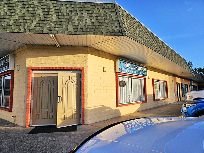 The unassuming exterior of The Lighthouse belies the seafood treasures within. Sometimes the best culinary journeys begin in strip malls.