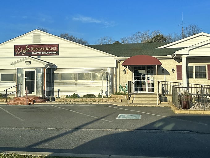 Doyle's Restaurant wears its unpretentious charm like a badge of honor. Those brick steps have welcomed generations of satisfied diners.