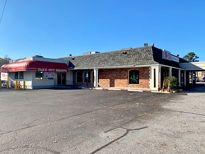A wider view reveals the unassuming brick exterior that houses culinary treasures – proof that the best restaurants don't need fancy facades to deliver memorable meals.