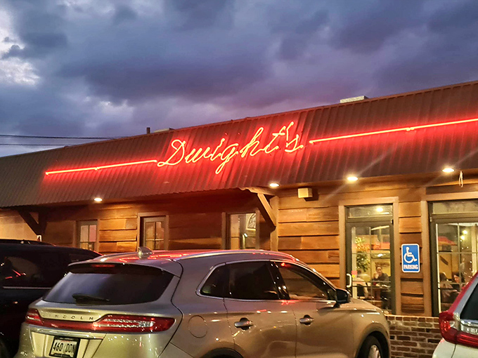 That neon glow isn't just a sign&mdash;it's a beacon of culinary promise that says, "Yes, tonight you're eating like a Louisiana local."