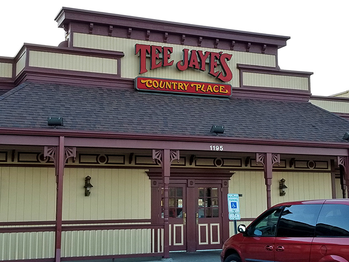 The iconic red signage of Tee Jaye's Country Place beckons like a lighthouse for the hungry, promising comfort food that'll hug your soul.