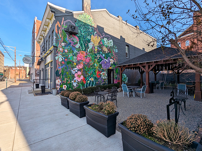 Morning light bathes the exterior of this downtown Wheeling gem. The vibrant mural serves as a beacon for hungry travelers seeking culinary salvation.