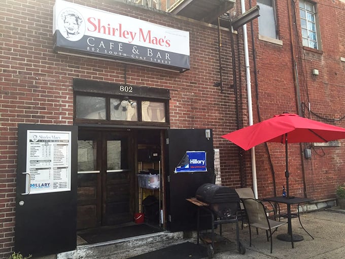 The entrance to flavor paradise &ndash; complete with a menu board that promises Southern classics and a shaded spot to savor the anticipation.