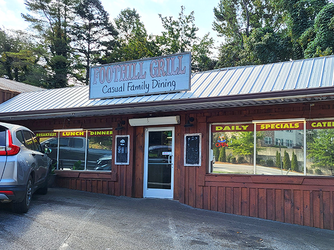 The unassuming wooden exterior of Foothill Grill might fool you, but locals know this modest facade hides culinary treasures that keep them coming back daily.