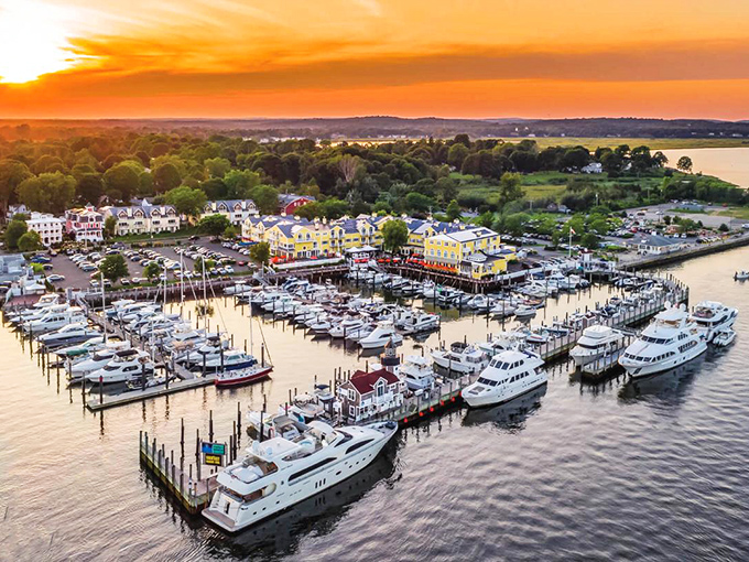 Sunset magic over Old Saybrook's marina, where boats worth more than my first house rest peacefully after a day at sea. Pure Connecticut coastal bliss.
