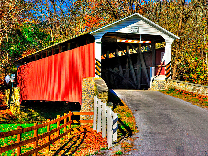 The classic red siding against Pennsylvania's blue sky creates that perfect "I've stepped back in time" moment at Mercer's Mill Covered Bridge.