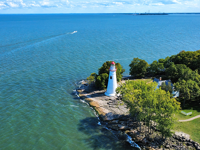 The quintessential Great Lakes postcard come to life&mdash;Marblehead's white sentinel stands guard where land meets water in perfect harmony.