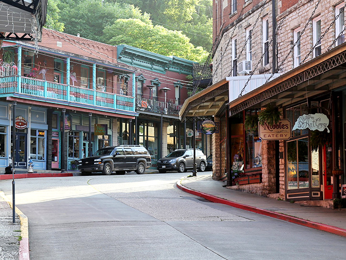 Downtown Eureka Springs looks like a movie set where Victorian architecture decided to have a block party with gravity-defying hillsides.