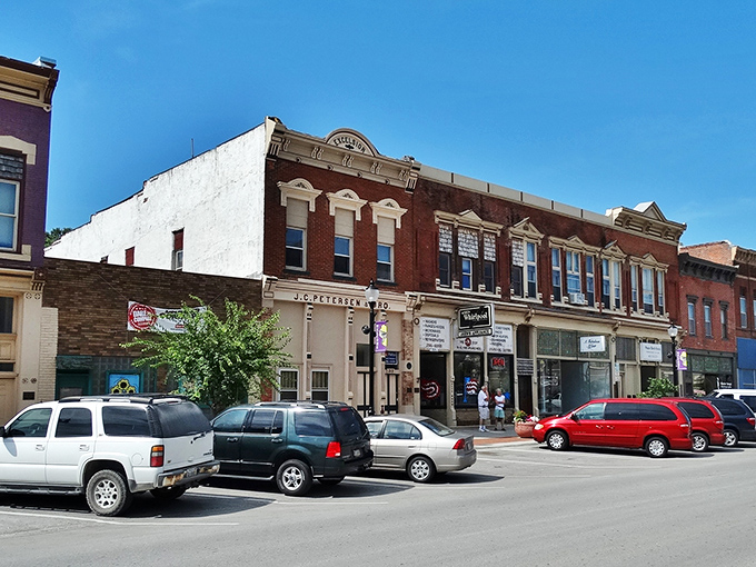 Historic brick buildings stand sentinel on Plattsmouth's Main Street, their ornate facades whispering stories of riverboat captains and railroad tycoons who once walked these streets.