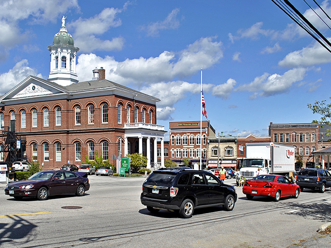 Exeter's Town Hall commands attention with its stately brick presence and gleaming white cupola—architectural eye candy that would make Thomas Jefferson nod approvingly.