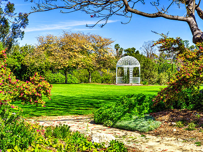 The white gazebo stands like a romantic novel come to life, surrounded by a tapestry of greenery that makes you forget you're just miles from LA's concrete jungle.