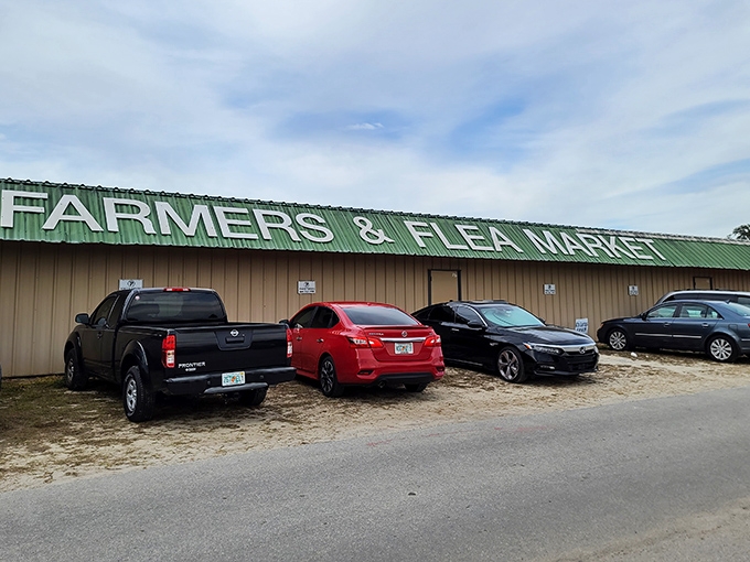 The Farmers & Flea Market sign welcomes bargain hunters and collectors alike &ndash; your first clue that wallet-emptying temptation lies just beyond those doors.