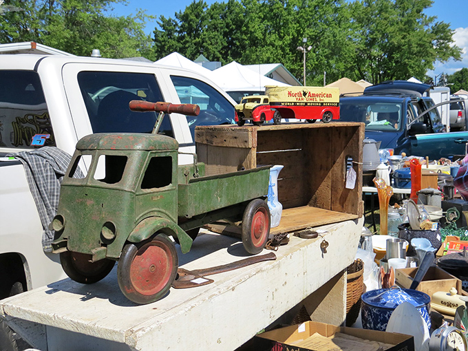 Nostalgia on wheels! This vintage toy truck might have hauled miniature lumber in a child's imagination decades ago, now waiting for its second chapter.