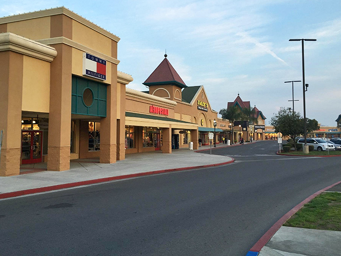 The Mediterranean-inspired architecture of Tulare Outlets welcomes bargain hunters with its distinctive turrets and covered walkways&mdash;retail therapy with a touch of California elegance.