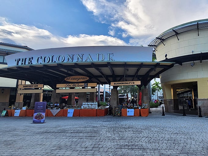 The grand entrance to retail therapy paradise, where your shopping dreams and budget nightmares collide under Florida sunshine.