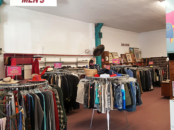 The men's section at Out of the Closet is like a treasure map where X marks the perfect vintage jacket you never knew you needed.