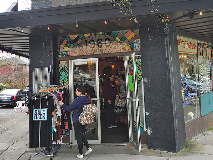 The black facade with its colorful stained glass "1960" sign isn't just a storefront&mdash;it's a time portal waiting to transport you to fashion's greatest hits.