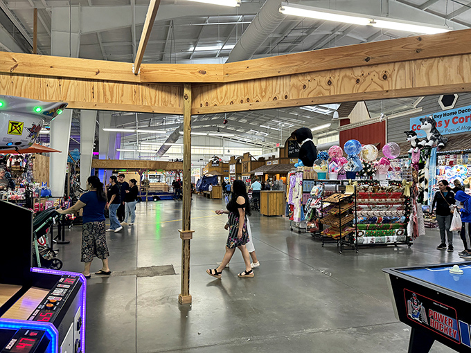 The indoor wonderland of La Vaquita stretches before you like a treasure map waiting to be explored, complete with wooden beams and colorful vendor stalls.