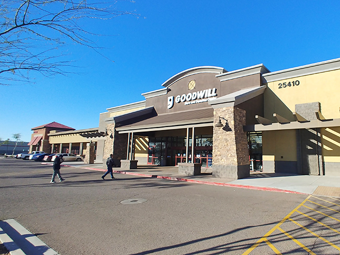 Bathed in Arizona sunshine, this Goodwill location stands ready for treasure seekers with its distinctive architecture and convenient parking.