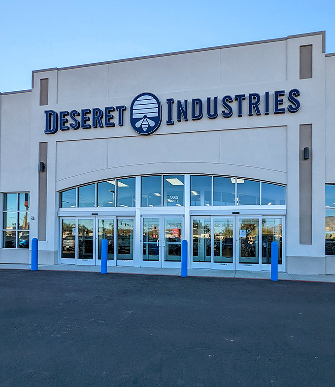 The gleaming facade of Deseret Industries stands like a temple to thrift, promising air-conditioned treasure hunting in the Arizona heat.