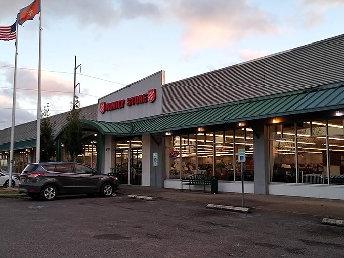 The green-trimmed storefront beckons like a treasure chest waiting to be opened. Louisiana's bargain hunters know this red shield means affordable fashion awaits.