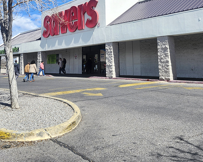 The iconic red Savers sign beckons like a lighthouse for bargain hunters navigating the sea of retail options in Albuquerque.