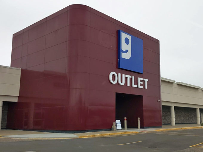 The unmistakable red cube with its cheerful blue smile logo stands like a beacon of bargain hope in Canton's retail landscape.