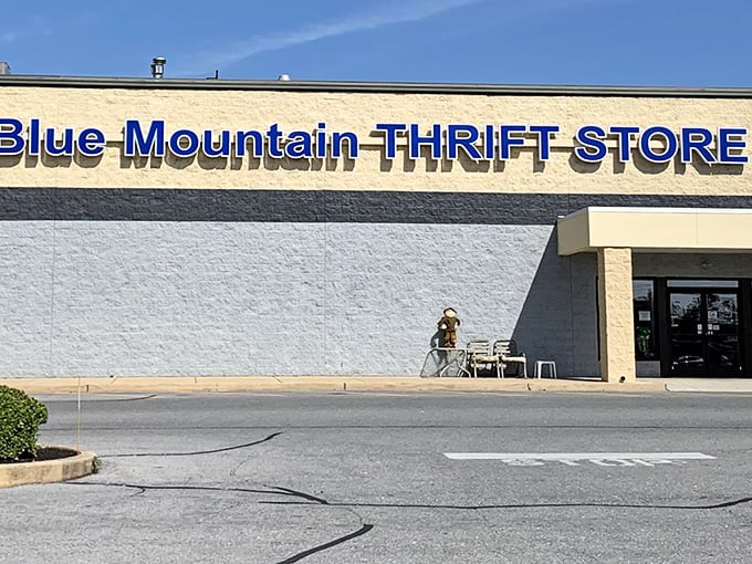 The unassuming exterior of Blue Mountain Thrift Store &ndash; where retail magic happens behind a modest fa&ccedil;ade. Like a poker player with a royal flush, it keeps its treasures hidden until you step inside.