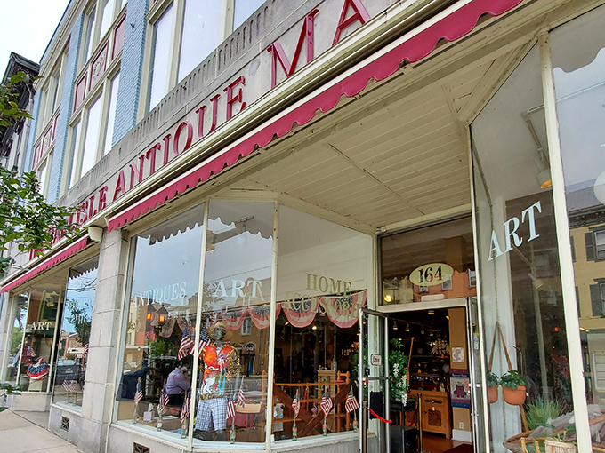 The iconic red awning of Carlisle Antique Mall beckons treasure hunters like a vintage siren song to downtown Carlisle's historic district.