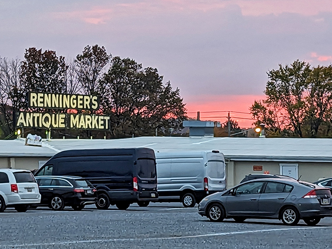 The iconic Renninger's sign against a sunset sky promises treasure hunting adventures that last well beyond closing time.