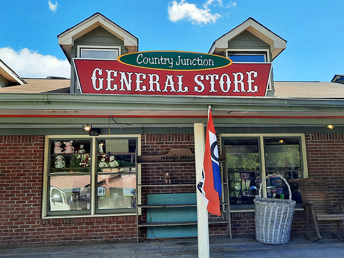 The Country Junction General Store welcomes treasure hunters with its classic brick façade and nostalgic signage – a time portal disguised as a storefront.