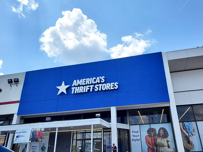 The iconic blue storefront with its white star logo stands like a beacon of bargain possibilities under the Alabama sky.