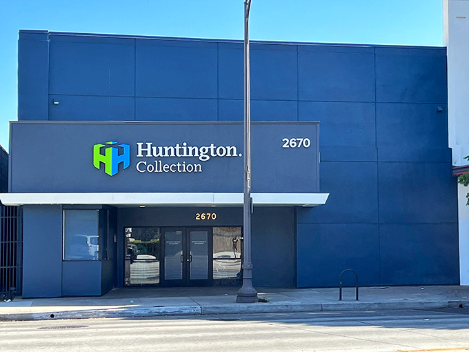 The sleek blue exterior of Huntington Collection belies the treasure trove within&mdash;like finding a portal to vintage paradise disguised as a modern building.
