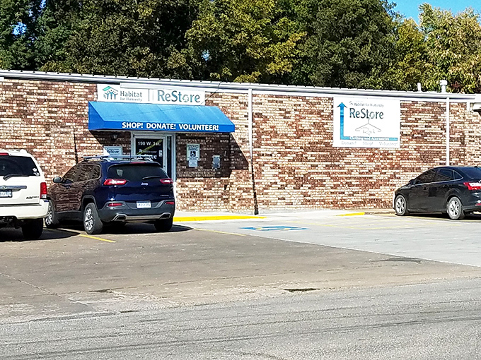 The unassuming brick exterior hides a wonderland of secondhand treasures, like finding Narnia in your neighbor's closet.