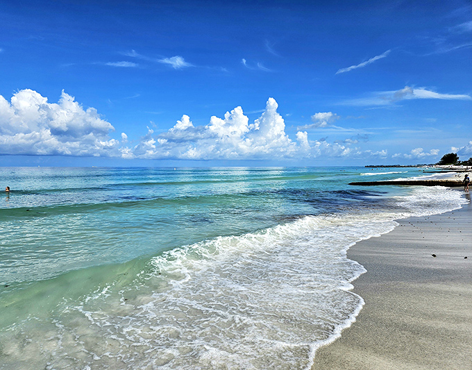 Where turquoise meets talcum powder. Coquina Beach's gentle waves create nature's perfect lullaby, inviting you to forget your to-do list and remember what vacation feels like.