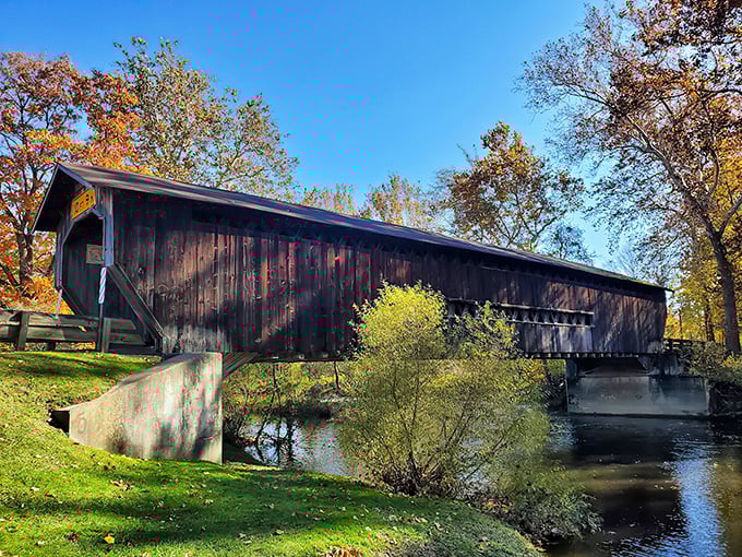 Fall's fiery palette creates the perfect backdrop for this wooden time machine. Mother Nature really knows how to frame architectural history.