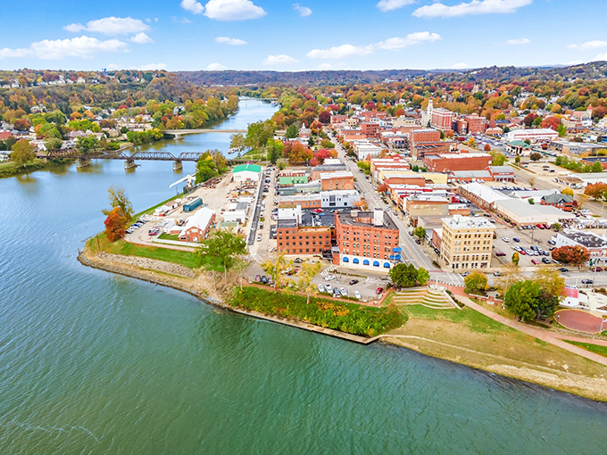 Marietta's stunning aerial view showcases where the Muskingum and Ohio Rivers meet, creating a picturesque peninsula that's been charming visitors since 1788.