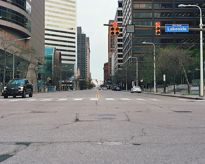 Downtown Lakeside sign stands sentinel over a quiet urban street. The calm before the storm of summer visitors.