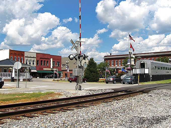 The vintage silver railcar stands sentinel over Sweetwater's historic downtown, a gleaming reminder of the town's railroad roots.