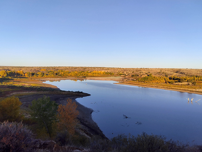 Lake Carl Etling catches the evening light like nature's own infinity pool, minus the Instagram influencers.