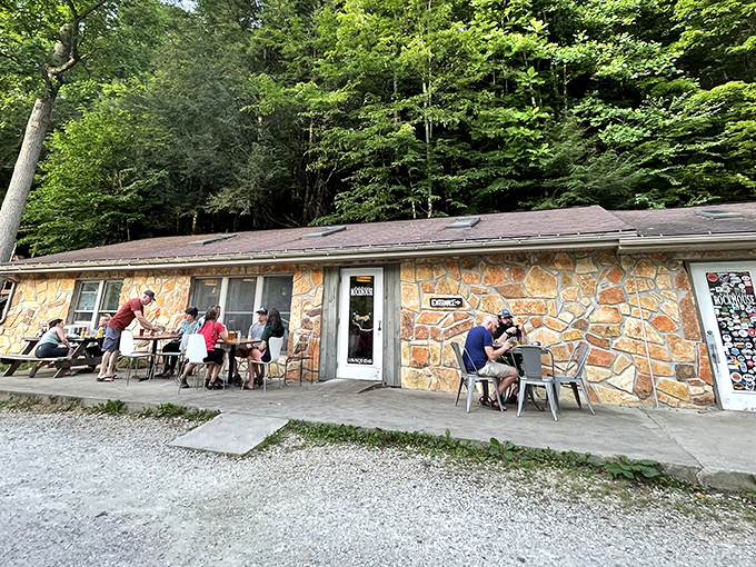 A stone facade that whispers "come in" while the forest behind shouts "you've found something special!" Kentucky's hidden culinary gem awaits.