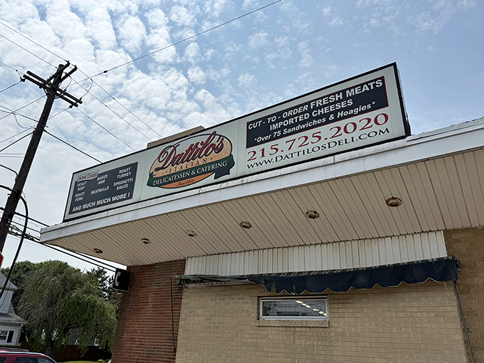 That iconic sign promises exactly what you'll find inside: fresh-cut meats, imported cheeses, and sandwiches that make fast food chains weep with inadequacy.