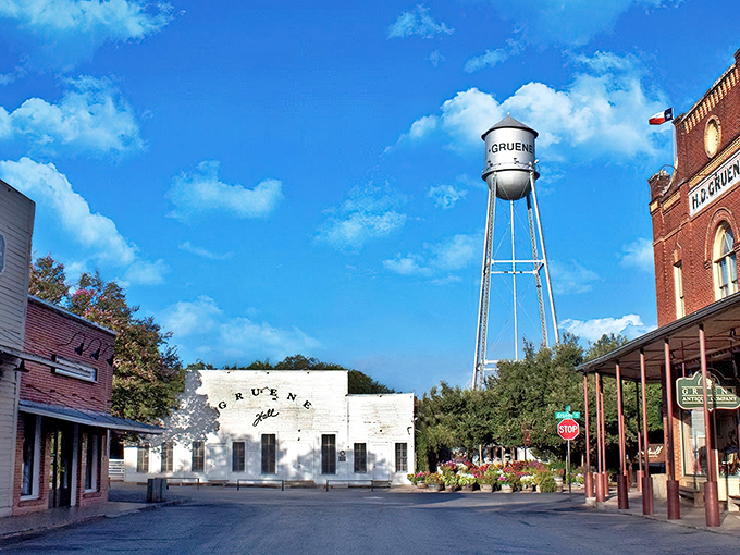 That iconic water tower presiding over historic storefronts is basically Gruene's way of saying "welcome to the past, but better."