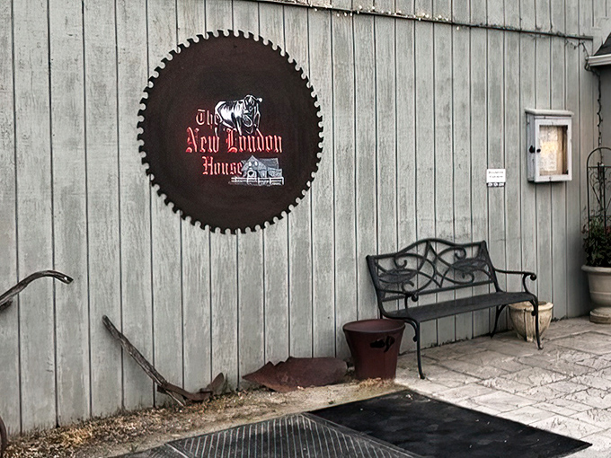 The circular saw sign announces your arrival at beef paradise with vintage flair&mdash;like a rustic welcome mat that whispers, "Hungry travelers, your search ends here."